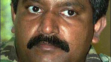 Tamil Leader Makes Appearance - CBS News