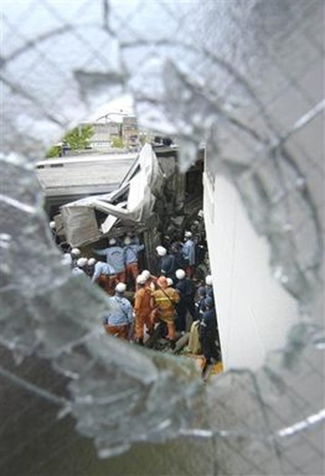 Japan Train Derailment - Photo 1 - CBS News