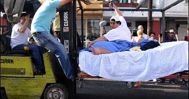 700-Pound Man Forklifted For A Day Out - CBS News
