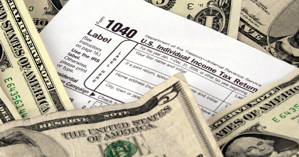 Why you shouldn't pay your taxes with a debit card - CBS News