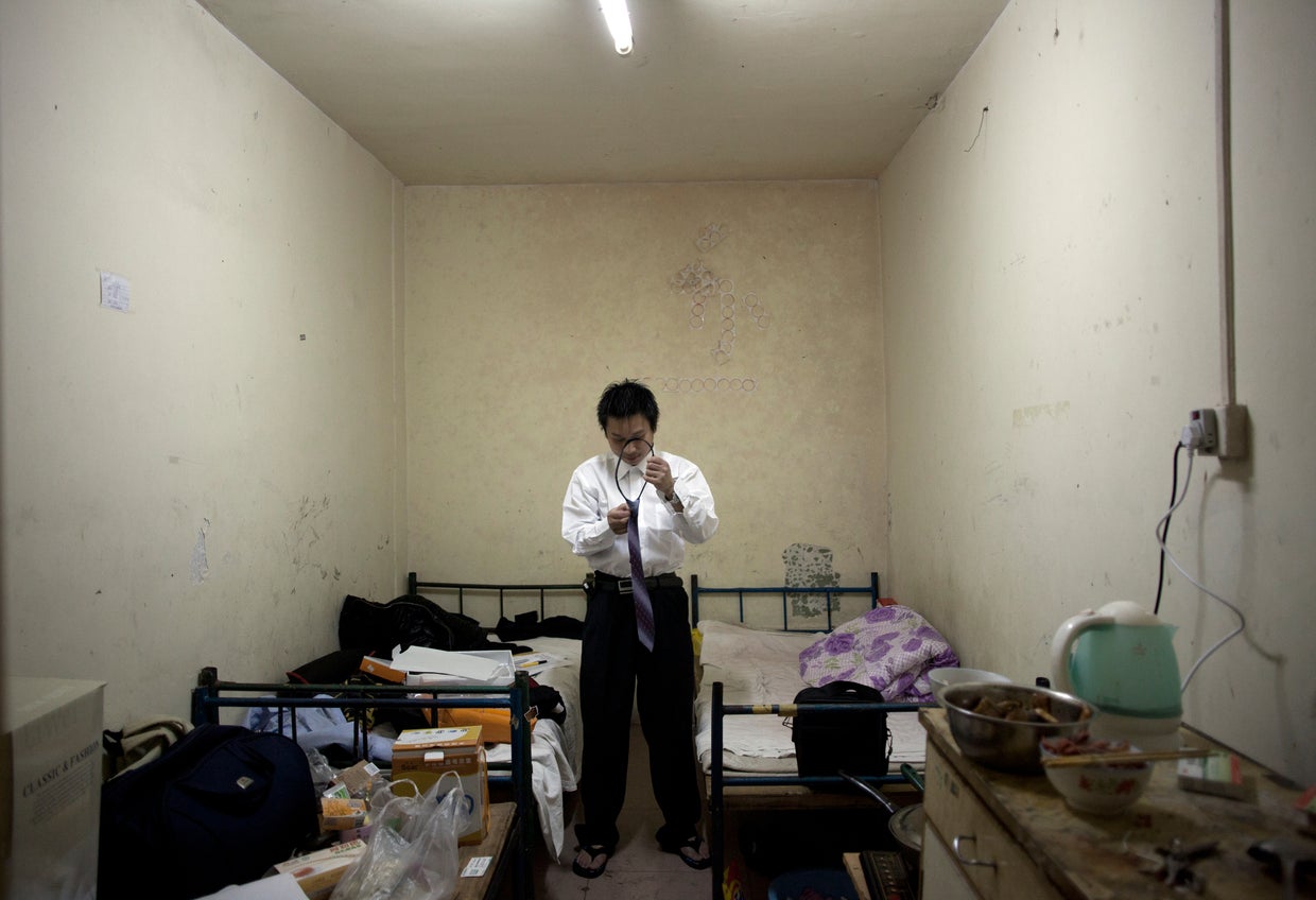 Basement living in China - CBS News