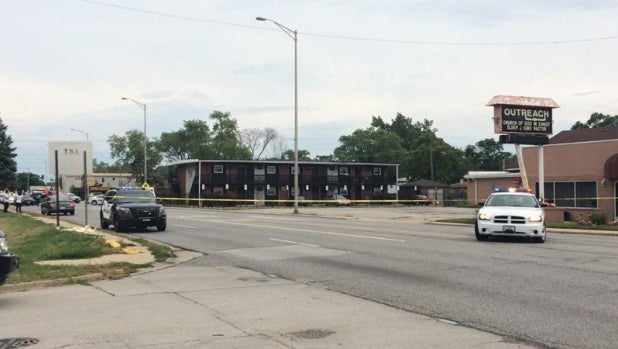 Two officers shot in hostage situation in Chicago suburb of Harvey ...