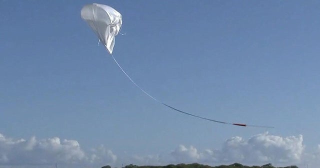 NASA test launches "flying saucer" for Mars mission - CBS News
