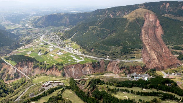 "Holy water" becomes life line after pair of Japan quakes - CBS News
