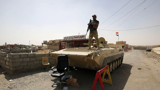 ISIS blamed for deadly triple suicide attack in Iraq - CBS News