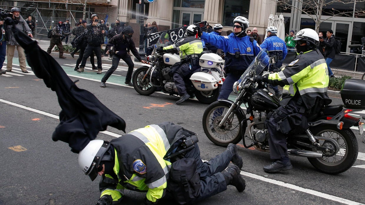 Trump inauguration protest damages parts of downtown Washington - CBS News