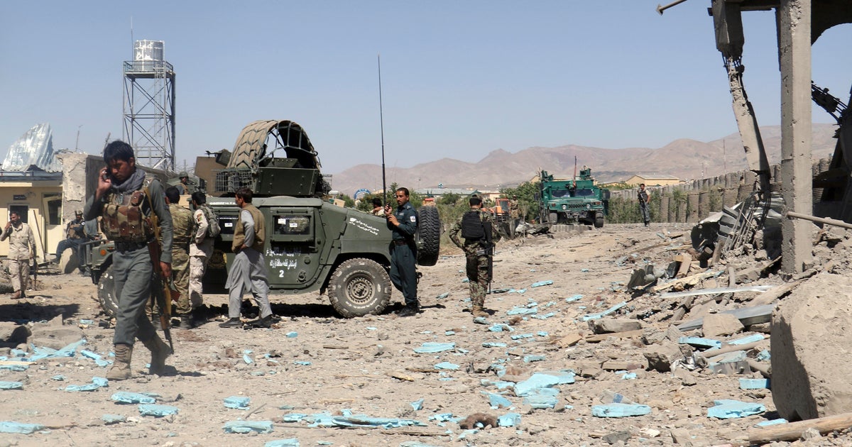 Taliban storms Afghan police compound in deadly attack - CBS News