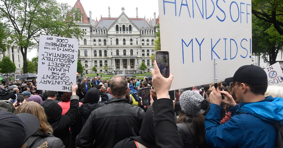 Protesters rally as New York lawmakers consider ending religious ...