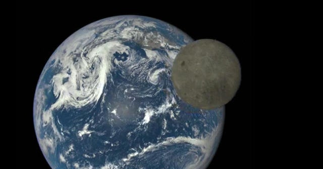 Stellar images of moon crossing over Earth - CBS News