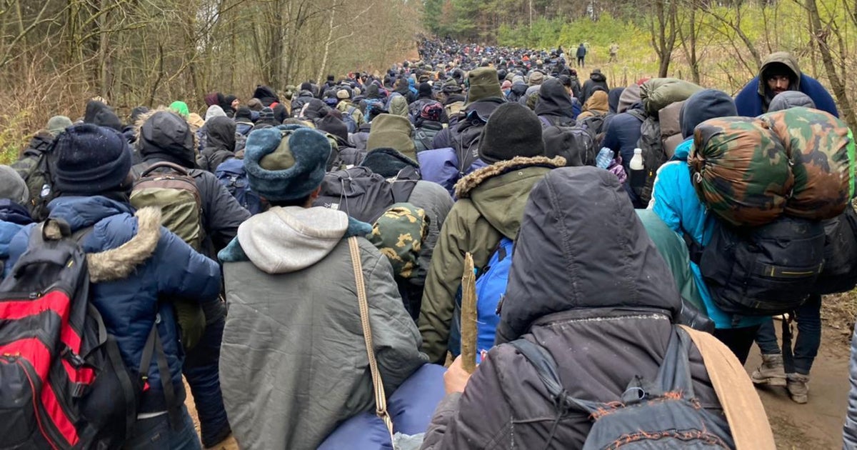 Migrants rescued barely conscious 30 miles from Poland's border with ...